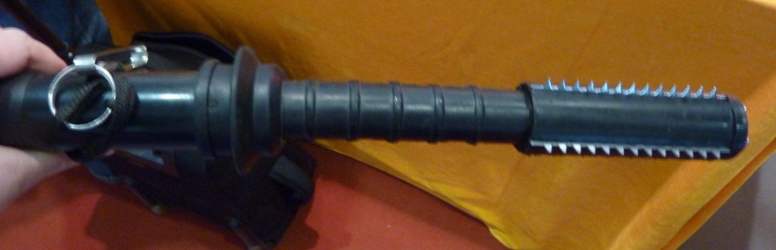 Spiked baton - Omega Research Foundation